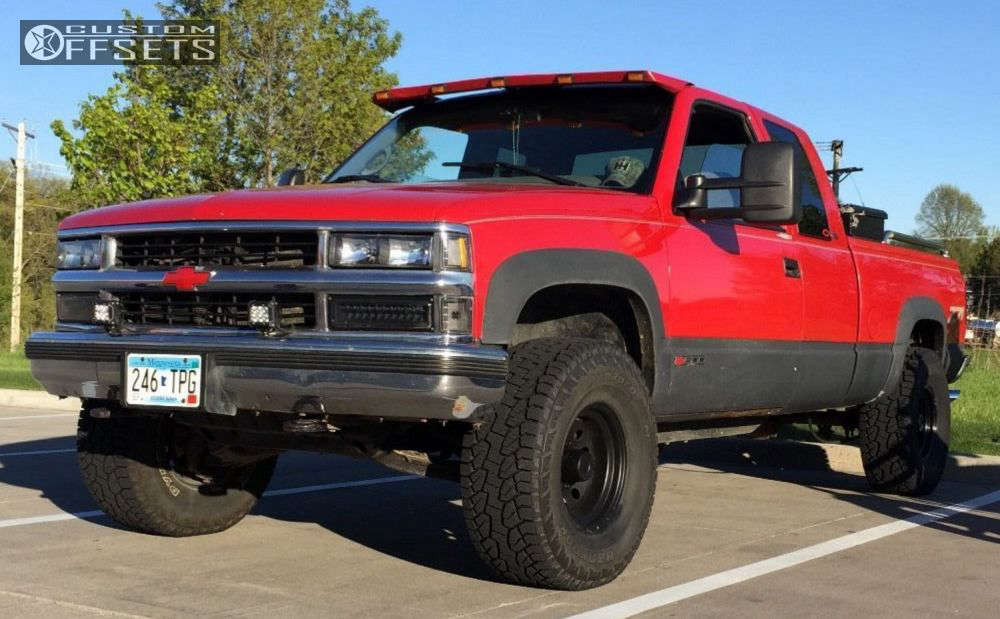 1998 Chevrolet K1500 with 15x10 -43 American Racing Baja and 33/12.5R15 ...