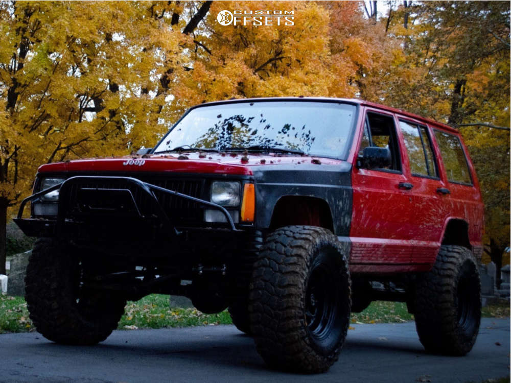 1996 Jeep Cherokee with 15x8 -6 Pro Comp 52 and 33/12.5R15 Cooper ...