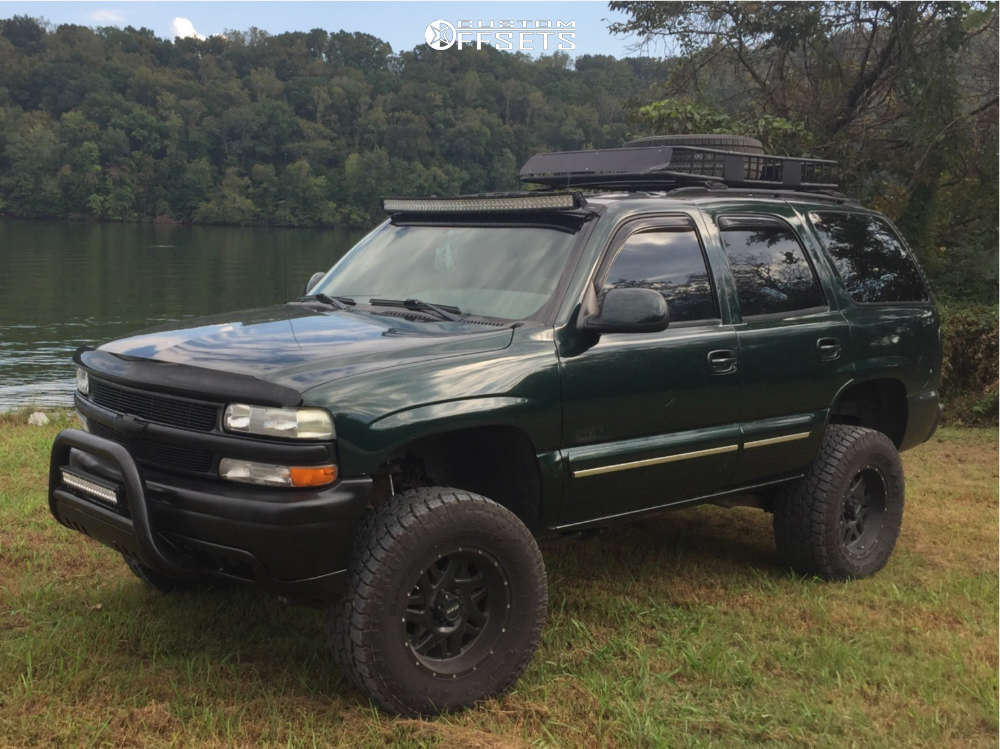 2003 Chevrolet Tahoe with 17x9 0 MKW M91 and 35/12.5R17 Toyo Tires Open ...