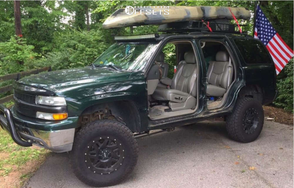 2003 Chevrolet Tahoe with 17x9 0 MKW M91 and 35/12.5R17 Toyo Tires Open ...