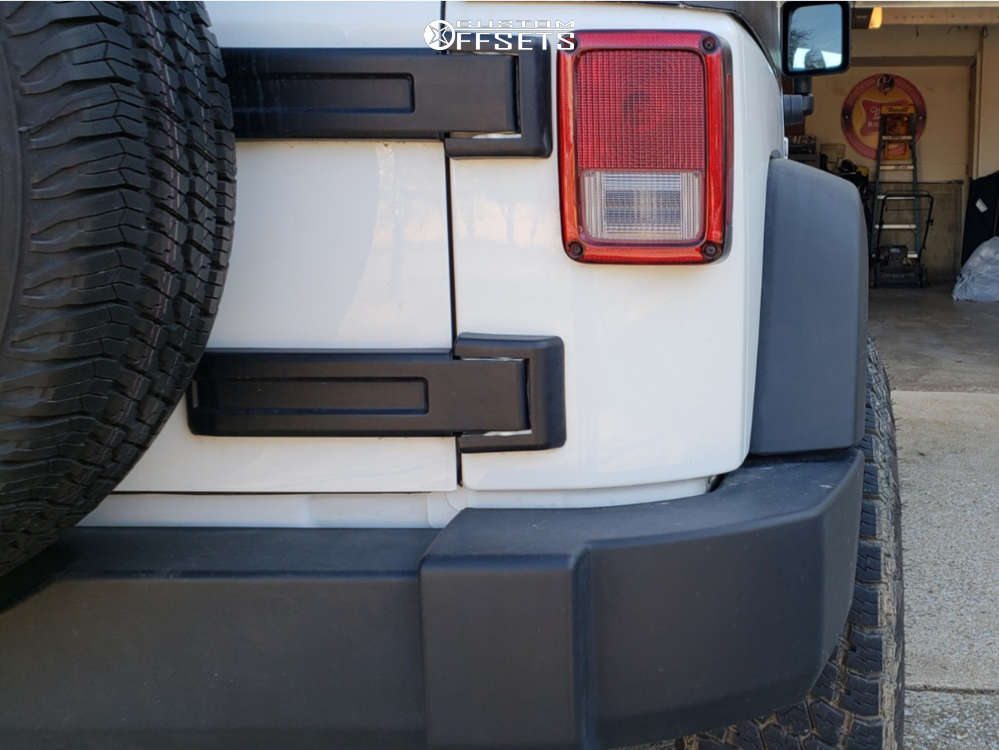 2014 Jeep Wrangler with 17x9 -12 American Racing Baja and 285/70R17 ...