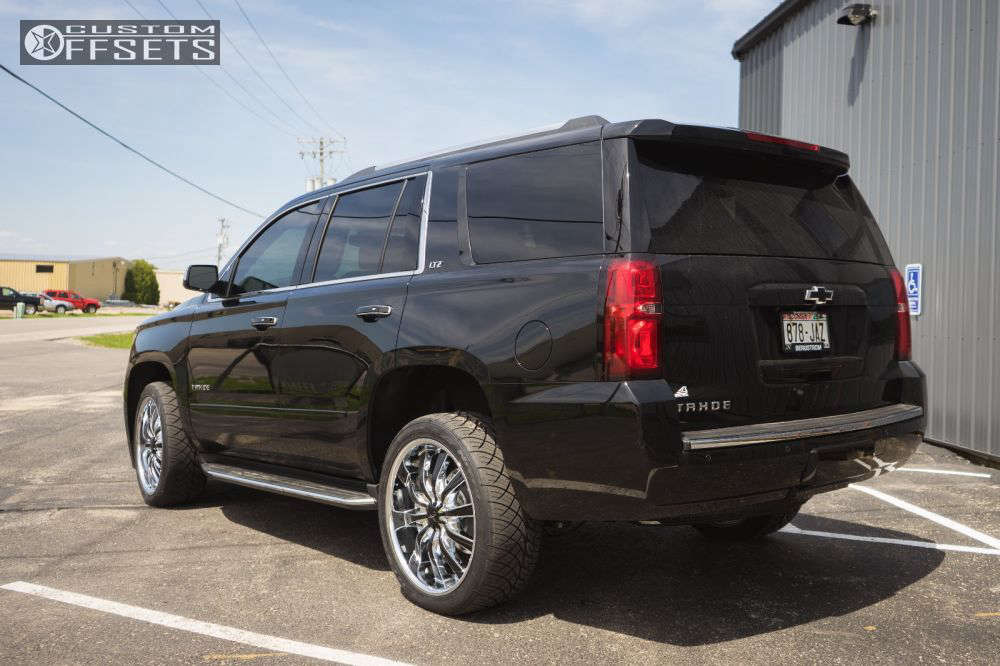 2016 Chevrolet Tahoe with 22x9.5 15 Helo He875 and 275/40R22 Nitto ...