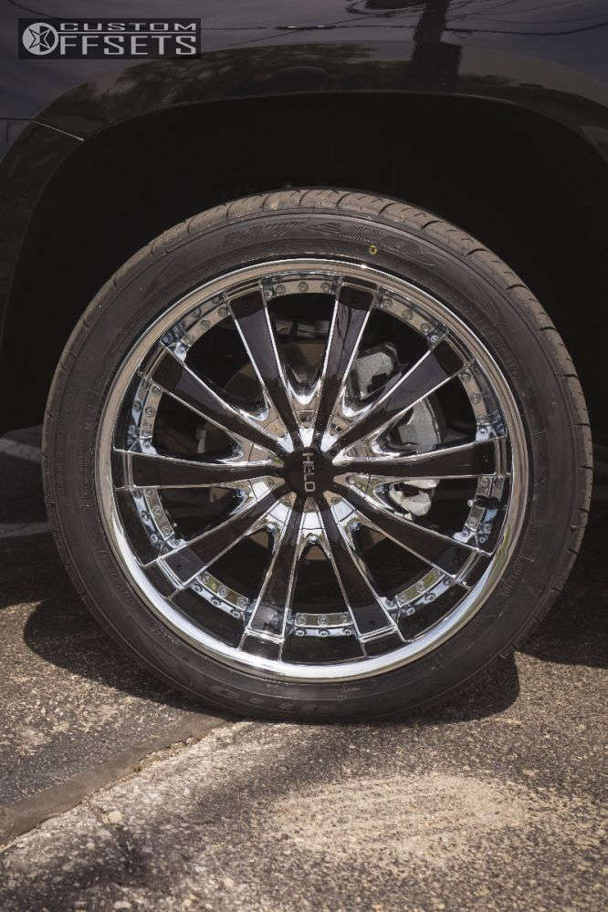 2016 Chevrolet Tahoe with 22x9.5 15 Helo He875 and 275/40R22 Nitto ...