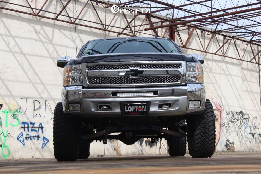 2012 Chevrolet Silverado 1500 with 22x12 -44 Hostile Alpha and 35/12.5R22 Atturo Trail Blade Mt ...