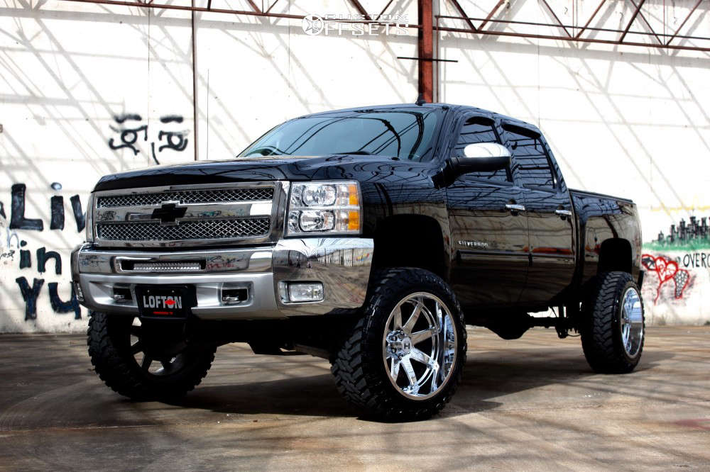2012 Chevrolet Silverado 1500 with 22x12 -44 Hostile Alpha and 35/12 ...