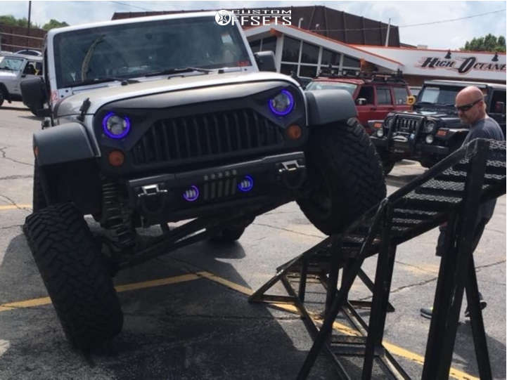 2012 Jeep Wrangler JK with 20x12 -44 Anthem Off-Road Gunner and 35/12 ...