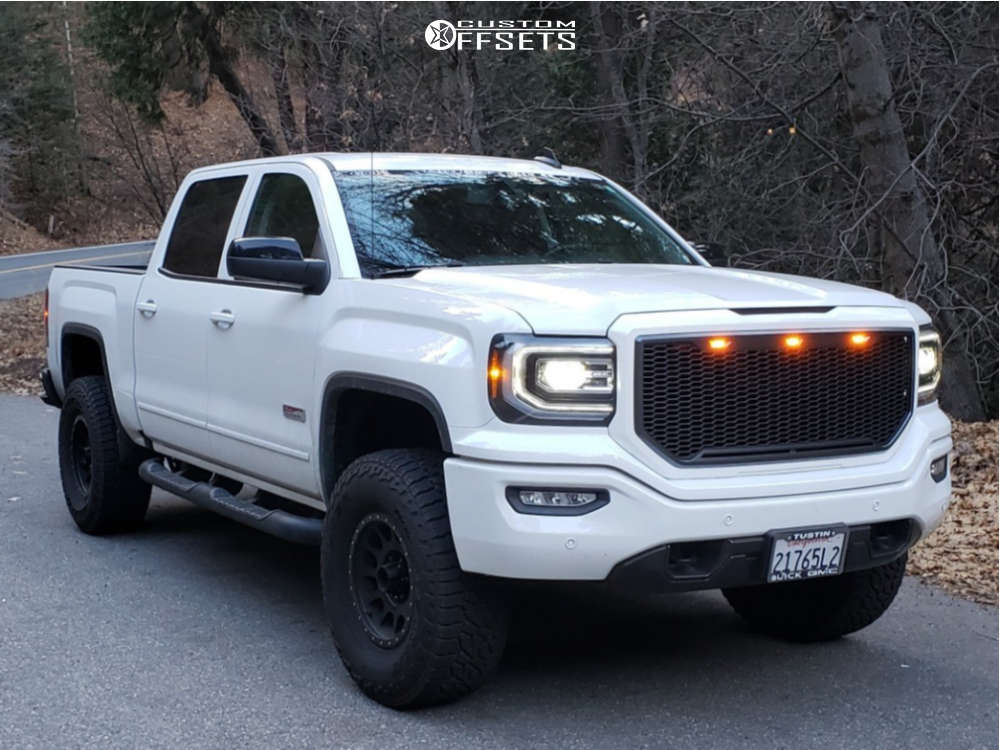 2018 GMC Sierra 1500 with 17x8.5 0 Method Mr105 and 315/70R17 Falken ...