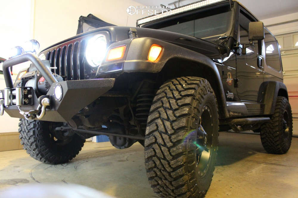 1999 Jeep TJ with 16x8 1 Fuel Revolver and 265/75R16 Atturo Trail Blade ...