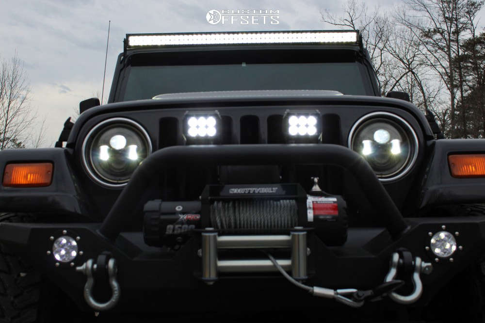 1999 Jeep TJ with 16x8 1 Fuel Revolver and 265/75R16 Atturo Trail Blade ...