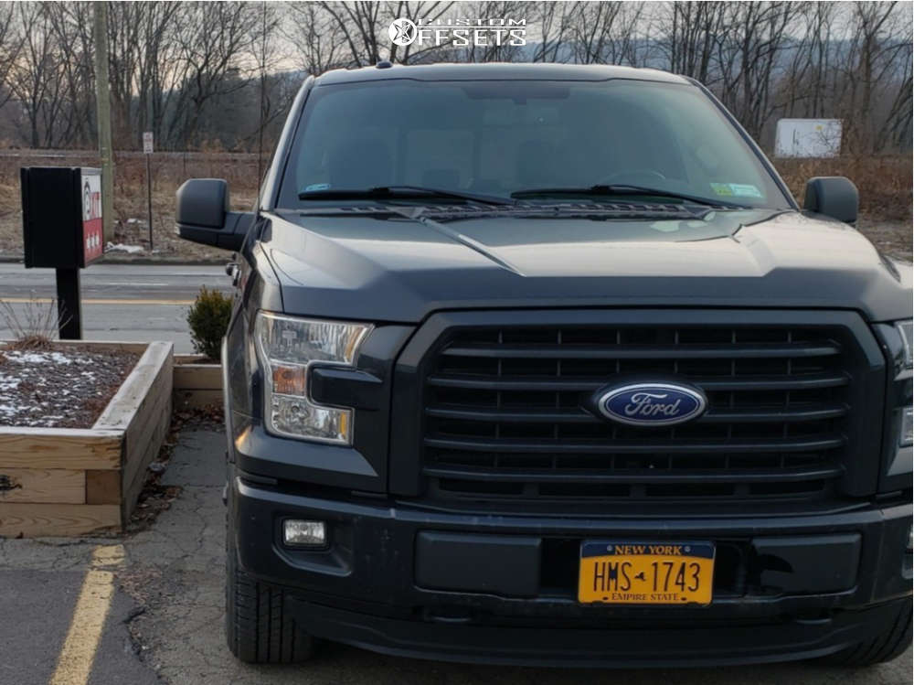 2015 Ford F-150 with 18x9 0 Pro Comp Series 31 and 265/60R18 Goodyear ...