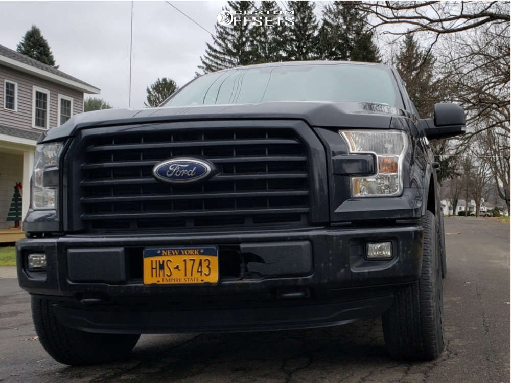 2015 Ford F-150 with 18x9 0 Pro Comp Series 31 and 265/60R18 Goodyear ...