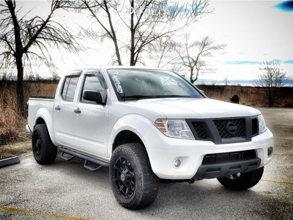 2012 Nissan Frontier with 18x9 -12 Anthem Off-Road Defender and 265 ...