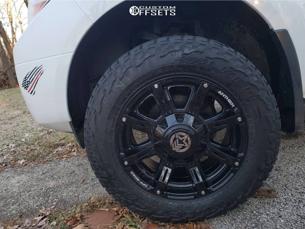 2012 Nissan Frontier with 18x9 -12 Anthem Off-Road Defender and 265 ...