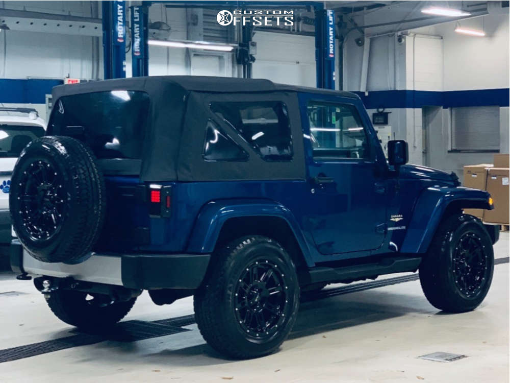 2009 Jeep Wrangler JK with 18x9 Helo He900 and 265/60R18 Firestone ...