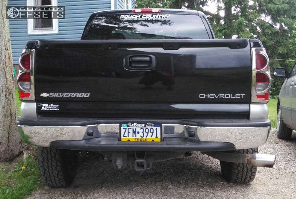 2004 Chevrolet Silverado 1500 with 16x9 American Racing Slider and 265 ...