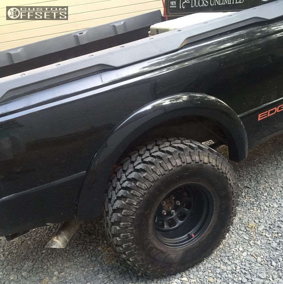 2002 Ford Ranger with 15x10 -44 Pro Comp 51 and 33/12.5R15 Firestone ...