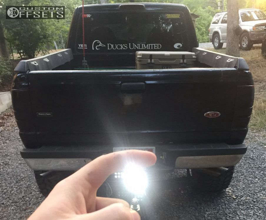 2002 Ford Ranger with 15x10 -44 Pro Comp 51 and 33/12.5R15 Firestone ...