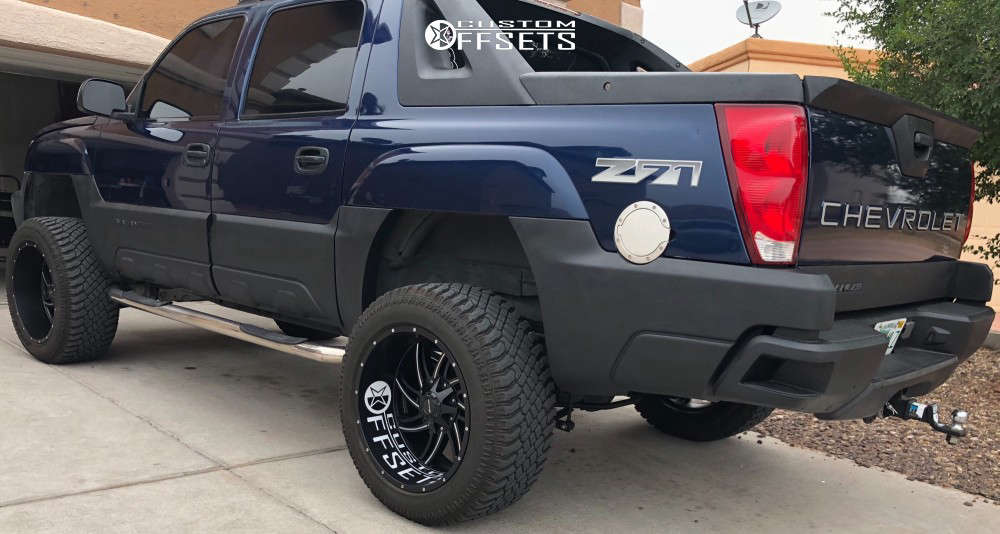2002 Chevrolet Avalanche 1500 with 22x12 -44 Savage Sa02 and 325/50R22 ...