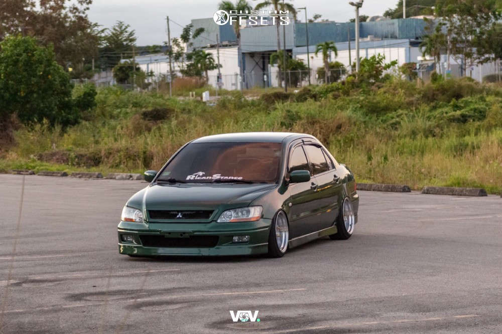 2003 Mitsubishi Lancer with 16x9 15 Klutch Sl2 and 195/45R16 Leao and ...