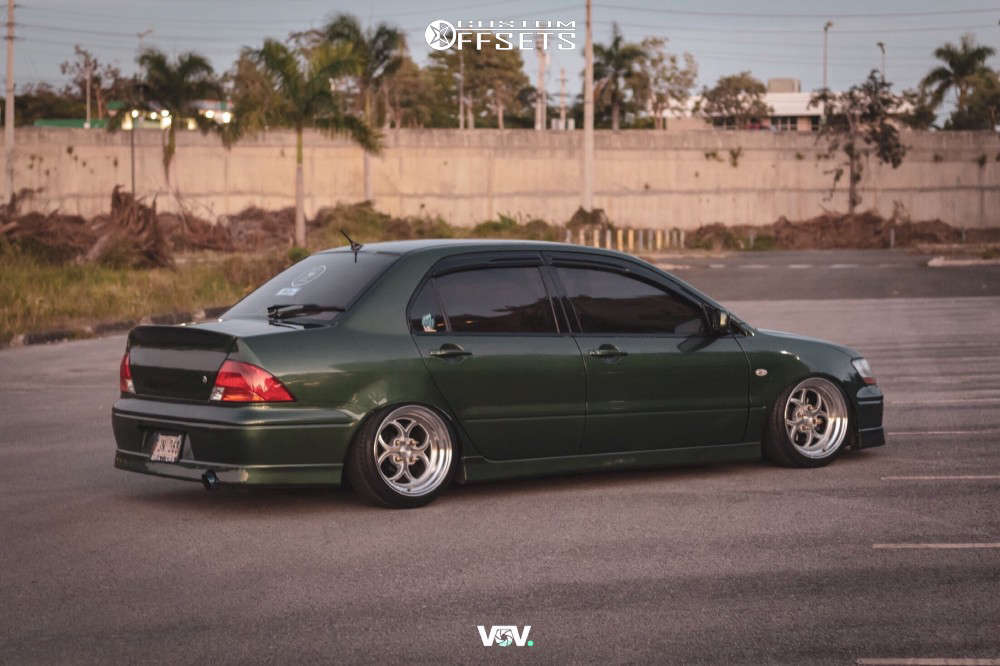 2003 Mitsubishi Lancer with 16x9 15 Klutch Sl2 and 195/45R16 Leao and ...