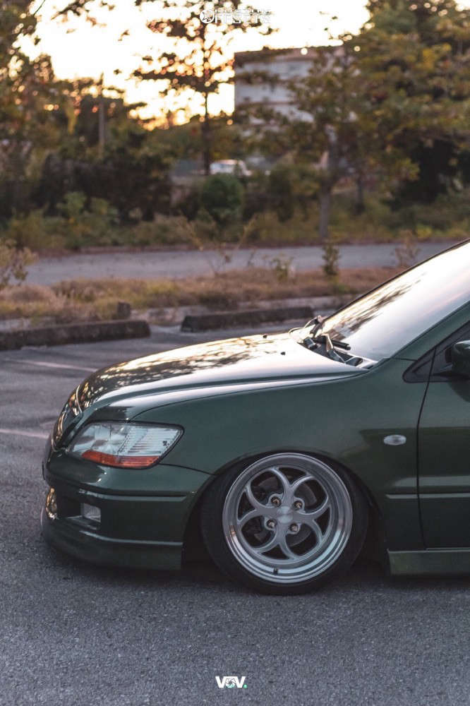 2003 Mitsubishi Lancer with 16x9 15 Klutch Sl2 and 195/45R16 Leao and ...