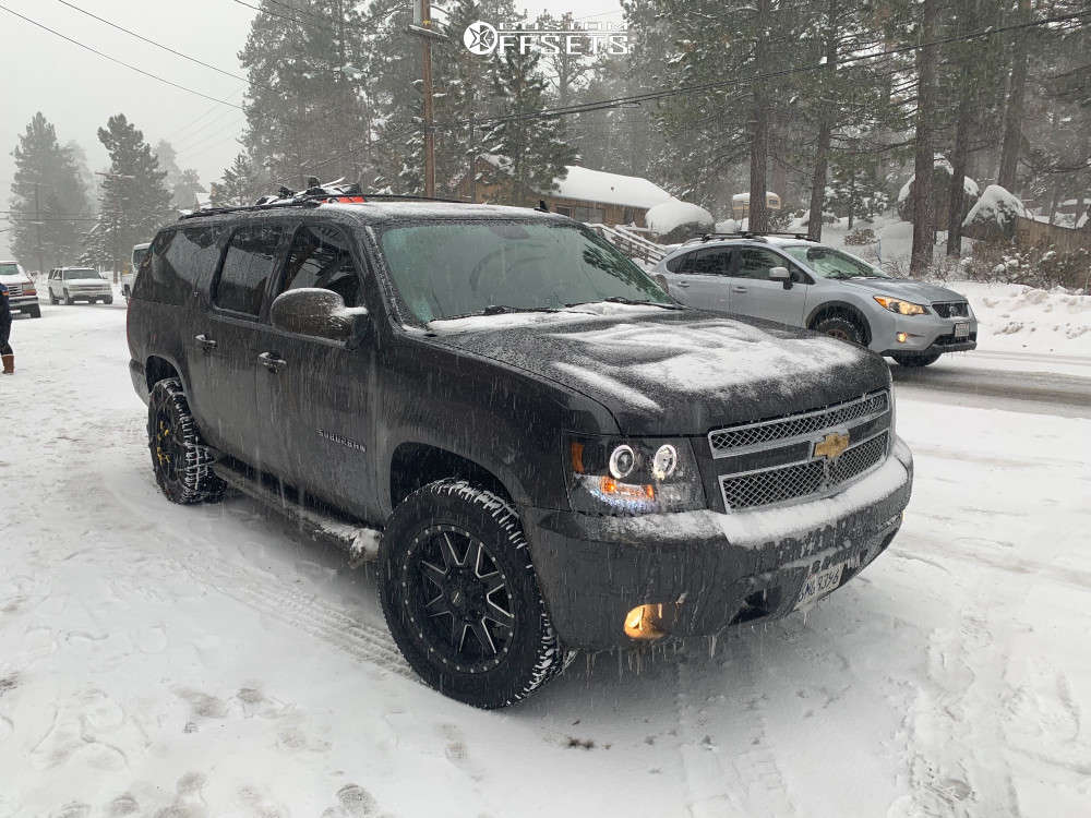 2010 Chevrolet Suburban 1500 with 20x9 0 Pro Comp Series 48 and 305 ...