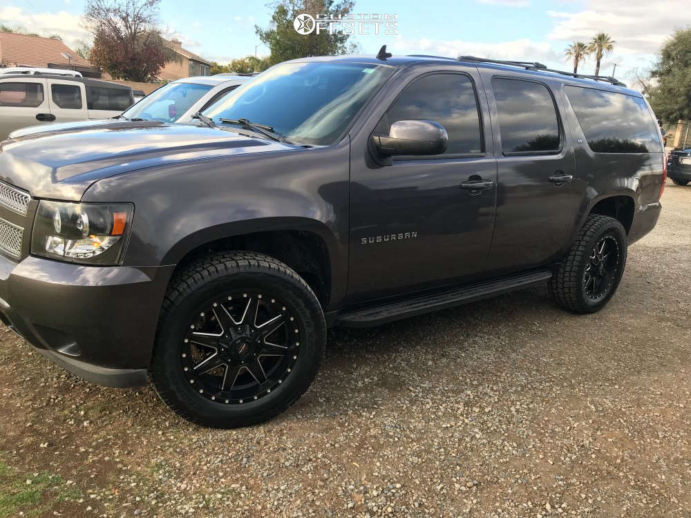 2010 Chevrolet Suburban 1500 with 20x9 0 Pro Comp Series 48 and 305/55R20 Cooper Discoverer X/t ...