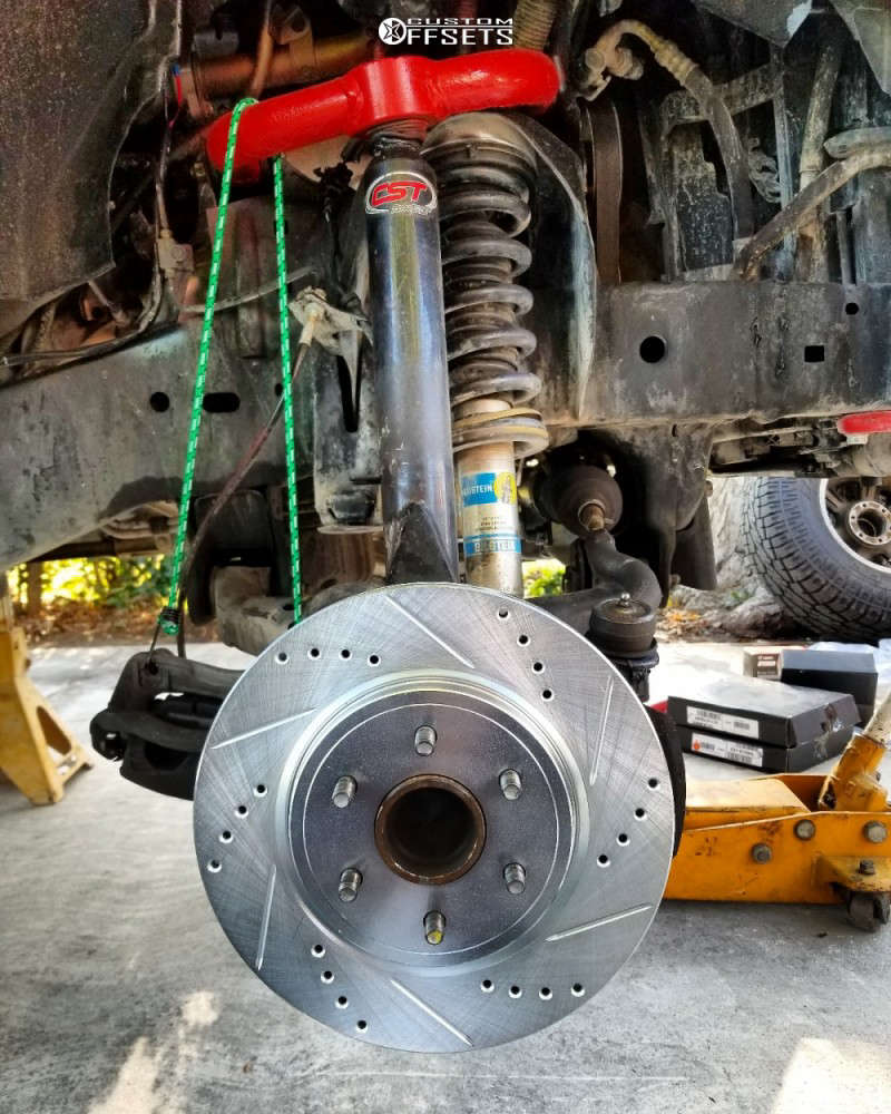 2008 Nissan Frontier with 18x9 -6 Pro Comp Series 89 and 35/12.5R18 Pro ...