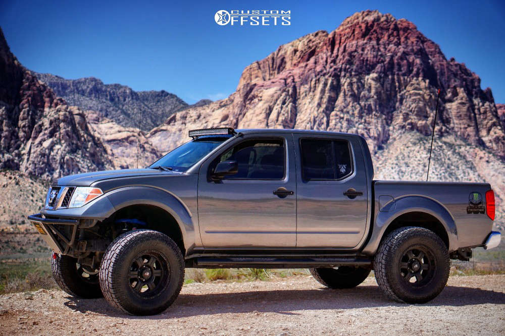 2008 Nissan Frontier with 18x9 -6 Pro Comp Series 89 and 35/12.5R18 Pro ...