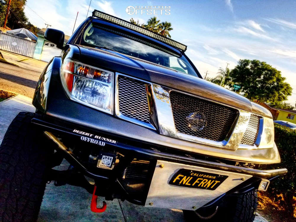 2008 Nissan Frontier with 18x9 -6 Pro Comp Series 89 and 35/12.5R18 Pro ...