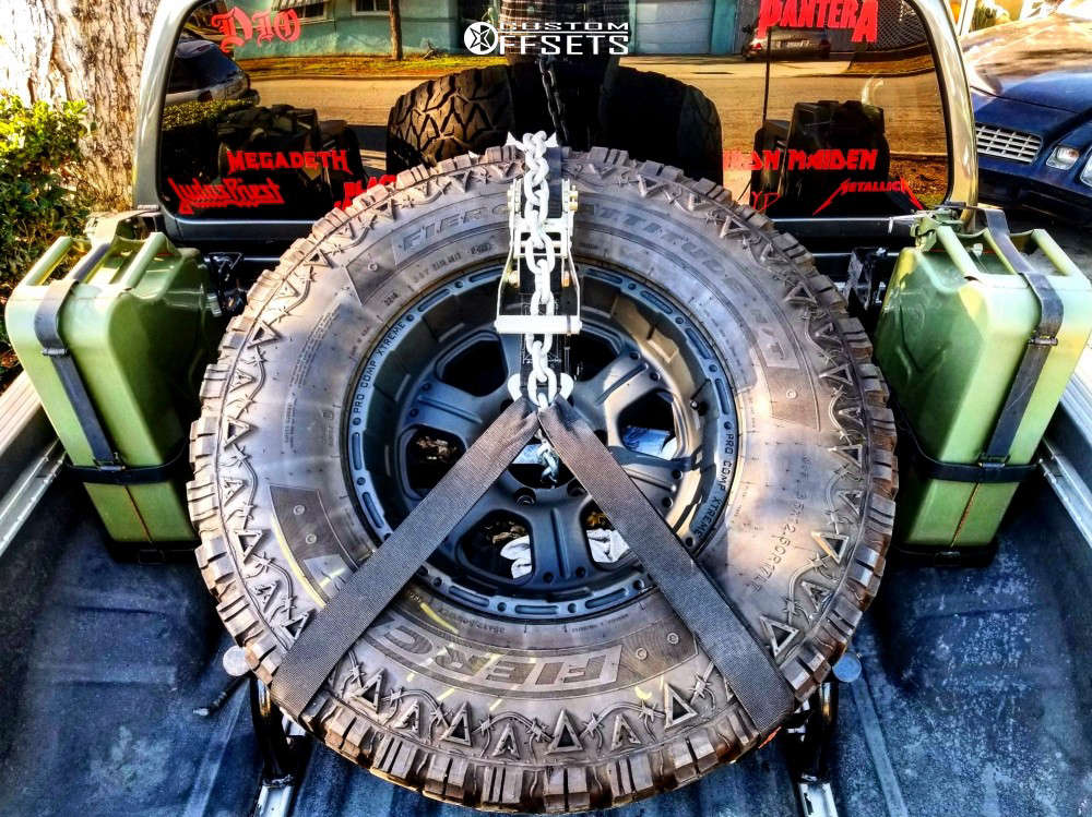 2008 Nissan Frontier with 18x9 -6 Pro Comp Series 89 and 35/12.5R18 Pro ...