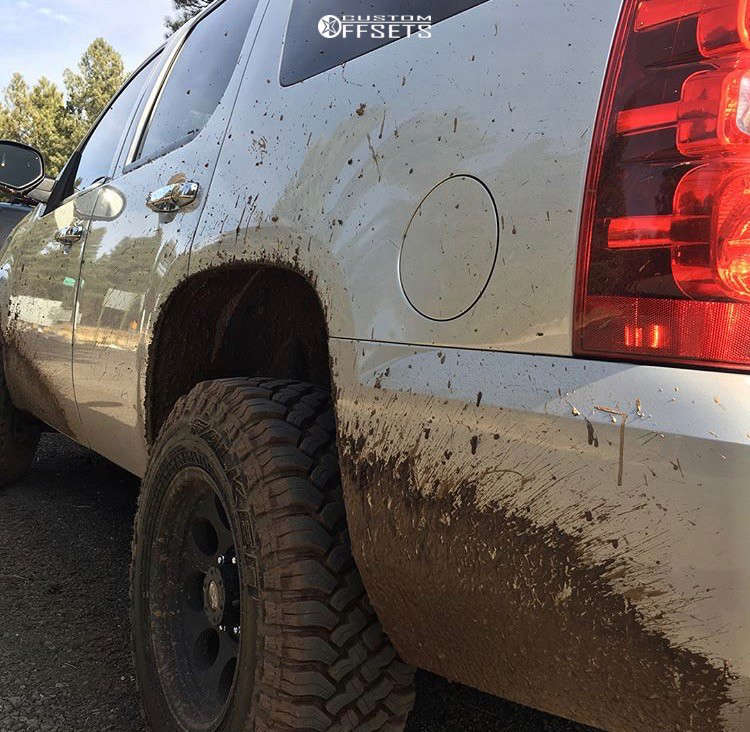 2011 Chevrolet Tahoe with 17x9 -6 Pro Comp 69 and 265/70R17 Falken ...