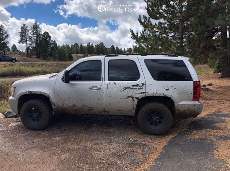 2011 Chevrolet Tahoe with 17x9 -6 Pro Comp 69 and 265/70R17 Falken ...