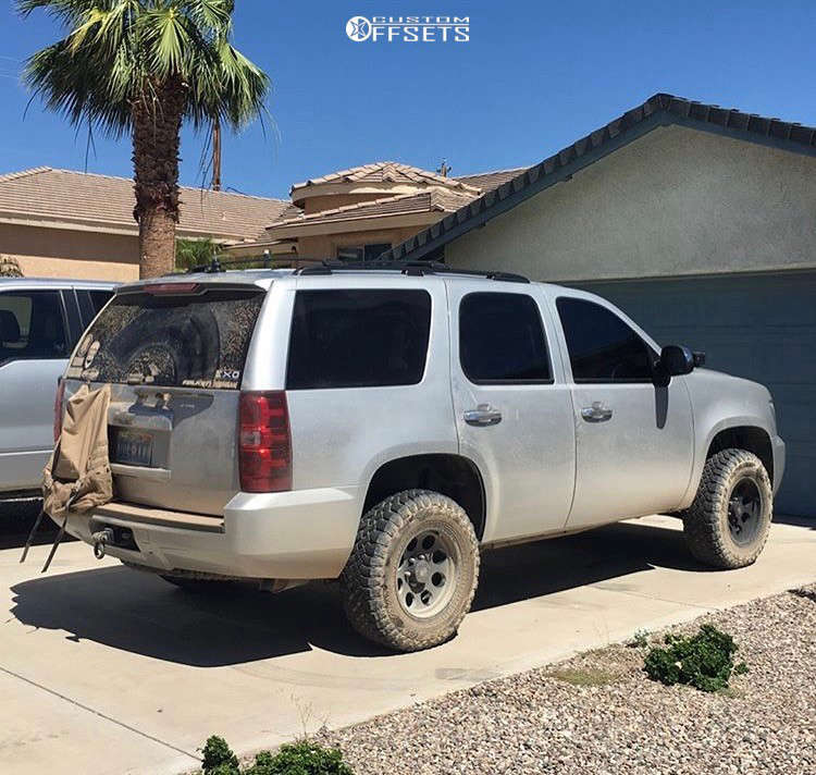 2011 Chevrolet Tahoe with 17x9 -6 Pro Comp 69 and 265/70R17 Falken ...