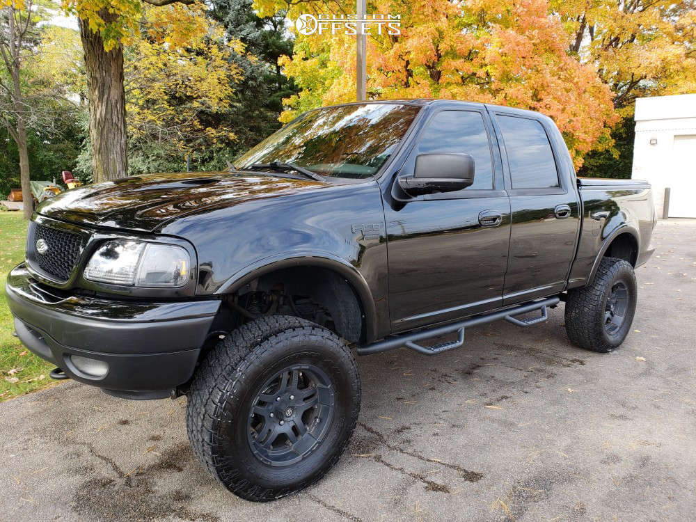 2003 Ford F-150 with 18x9 American Racing ATX Artillery and 35/12.5R18 ...