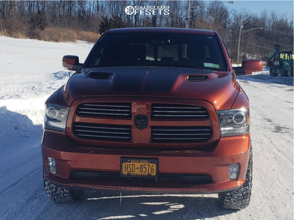 2017 Ram 1500 with 20x9 0 Moto Metal Mo991 and 33/11.5R20 Nitto Ridge ...