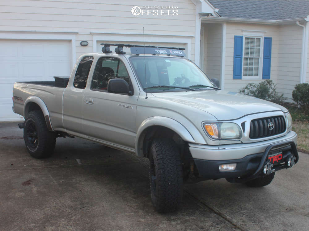 2004 Toyota Tacoma with 16x9 -12 Helo He878 and 265/75R16 BFGoodrich ...