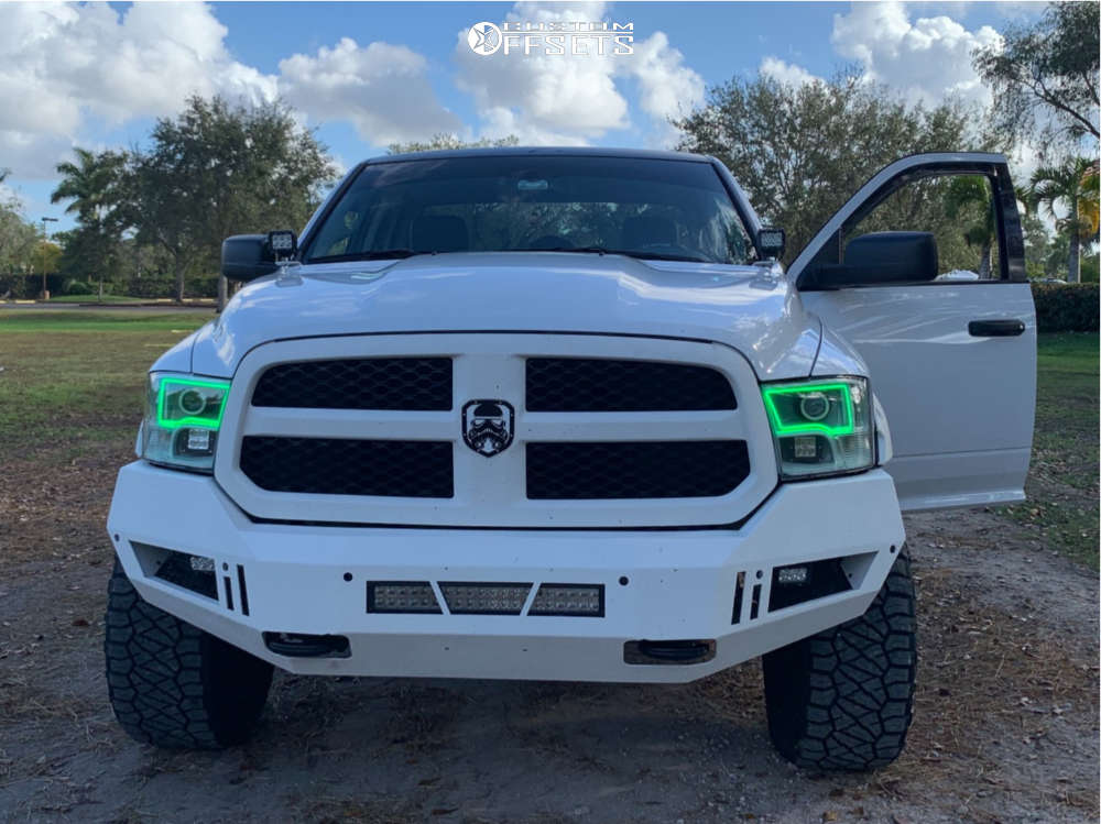 2017 Ram 1500 with 20x12 -44 Tuff T10 and 33/12.5R20 Nitto Ridge ...