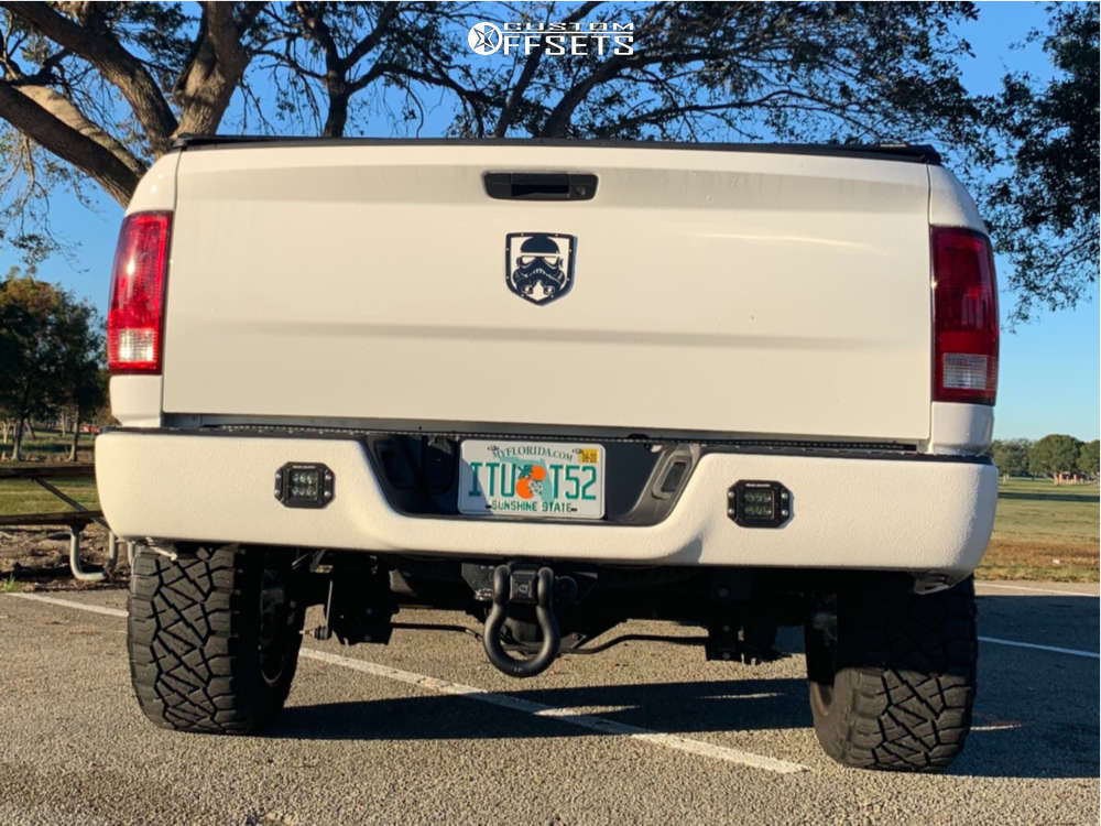 2017 Ram 1500 with 20x12 -44 Tuff T10 and 33/12.5R20 Nitto Ridge ...