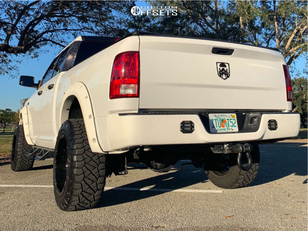 2017 Ram 1500 with 20x12 -44 Tuff T10 and 33/12.5R20 Nitto Ridge ...