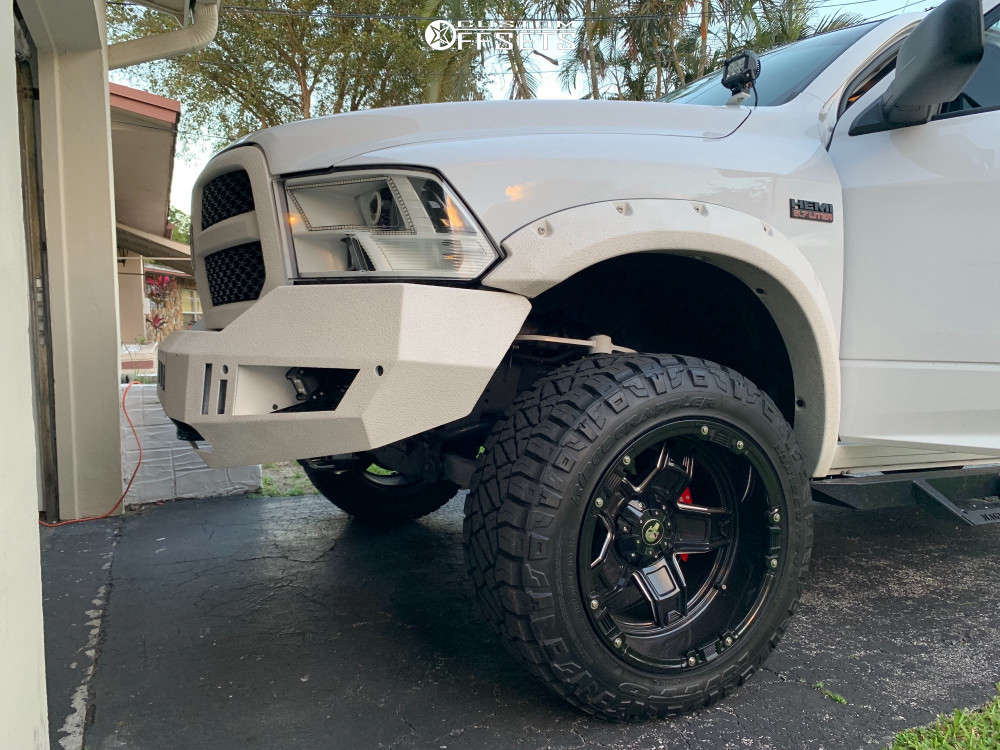2017 Ram 1500 with 20x12 -44 Tuff T10 and 33/12.5R20 Nitto Ridge ...