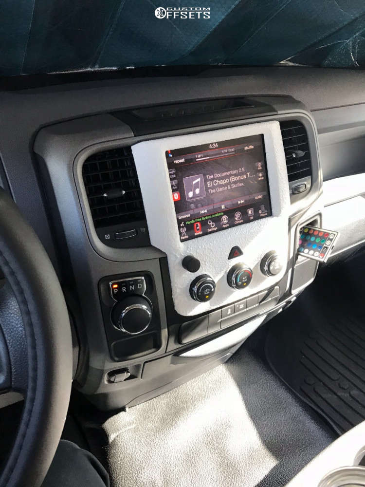 2017 Ram 1500 with 20x12 -44 Tuff T10 and 33/12.5R20 Nitto Ridge ...