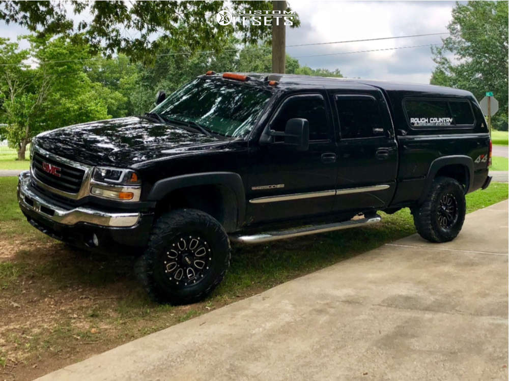 2006 GMC Sierra 2500 HD with 16x8 0 Helo He879 and 305/70R16 Goodyear ...