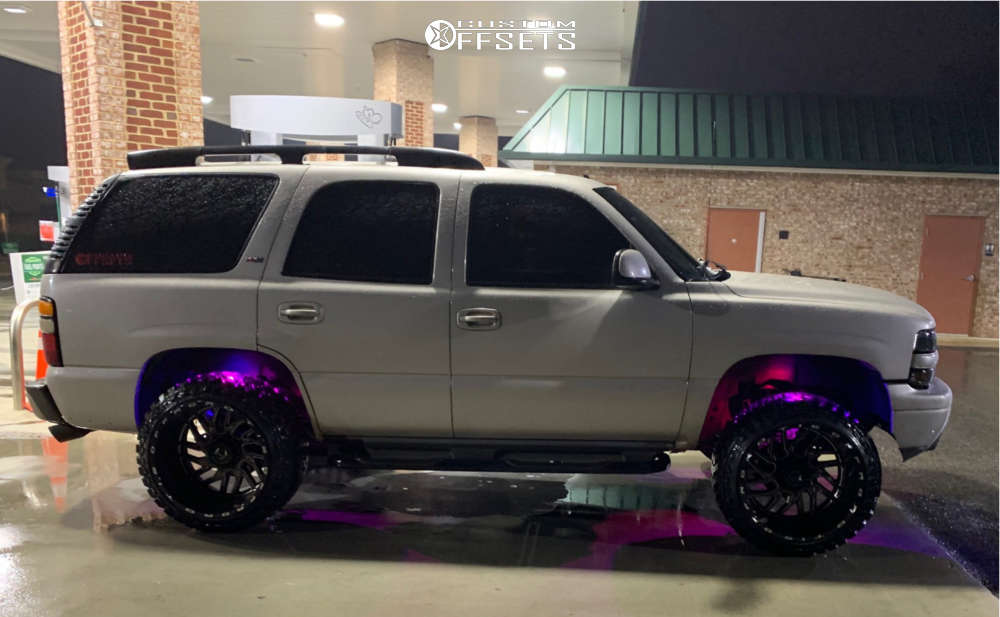 2006 Chevrolet Tahoe with 22x14 -76 TIS 544BM and 33/12.5R22 Atturo ...