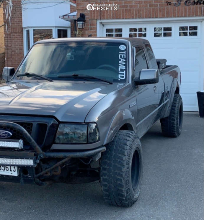 2009 Ford Ranger with 15x10 -47 Pro Comp Series 69 and 31/10.5R15 Dick ...