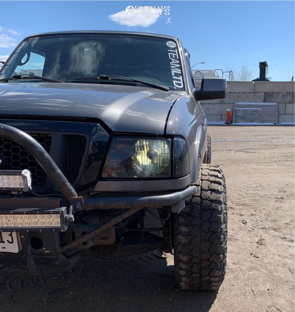 2009 Ford Ranger with 15x10 -47 Pro Comp Series 69 and 31/10.5R15 Dick ...