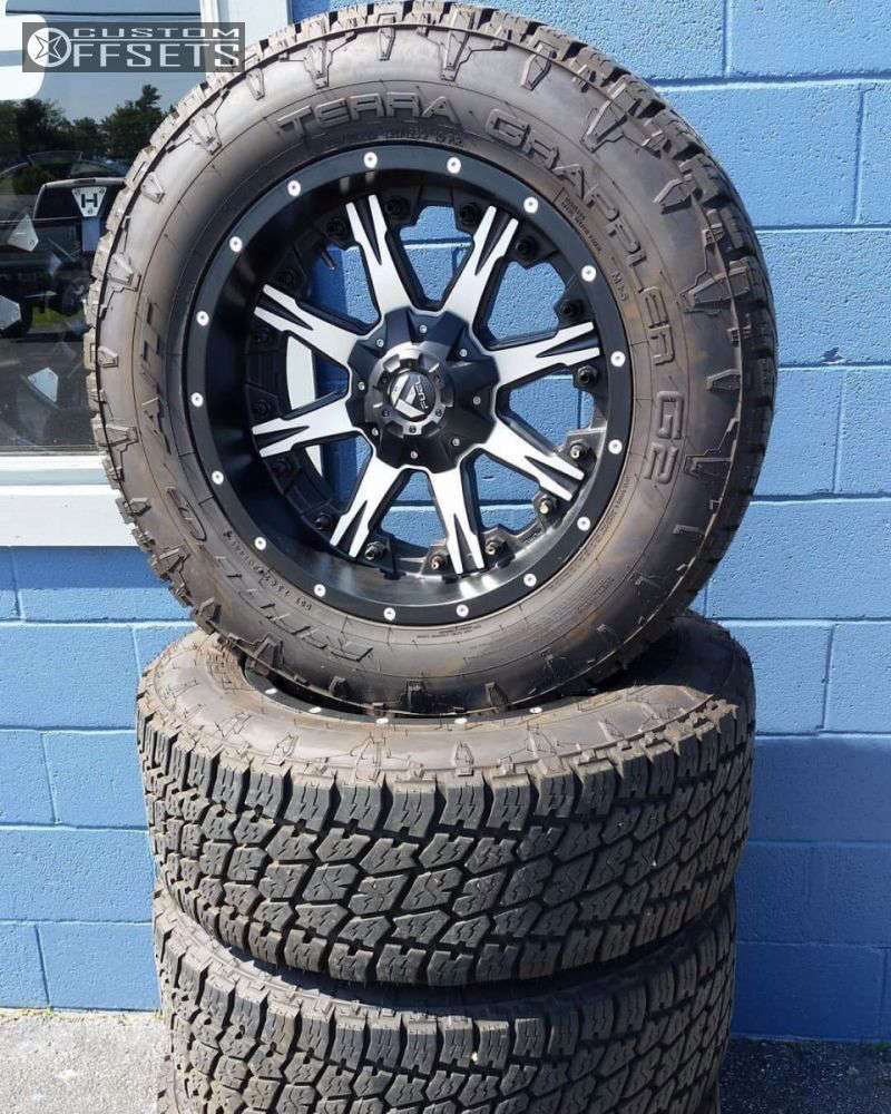 2006 Dodge Ram 1500 with 20x10 -24 Fuel Nutz and 295/60R20 Nitto Terra ...
