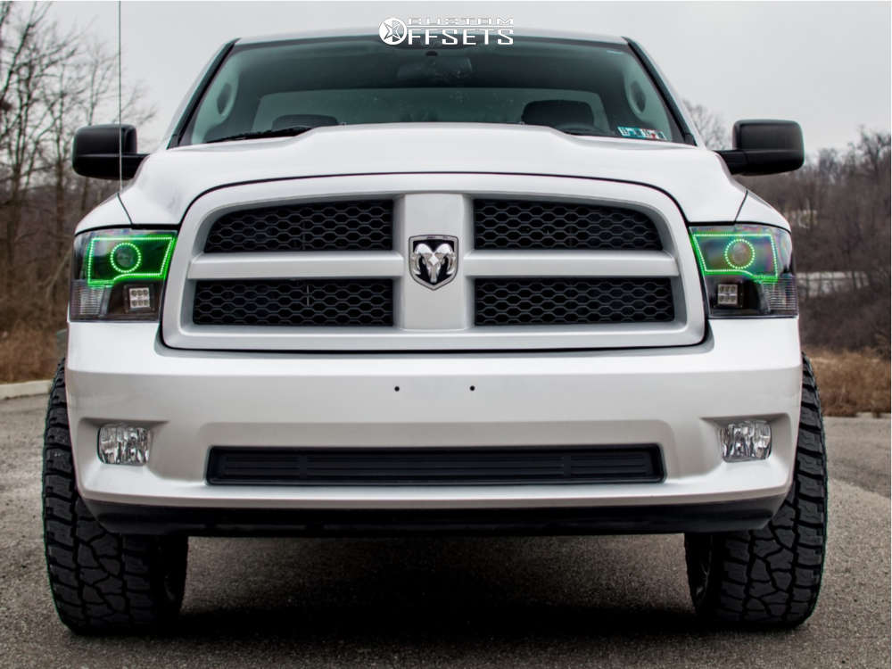 2011 Ram 1500 with 20x10 -24 Anthem Off-Road Gunner and 305/55R20 ...