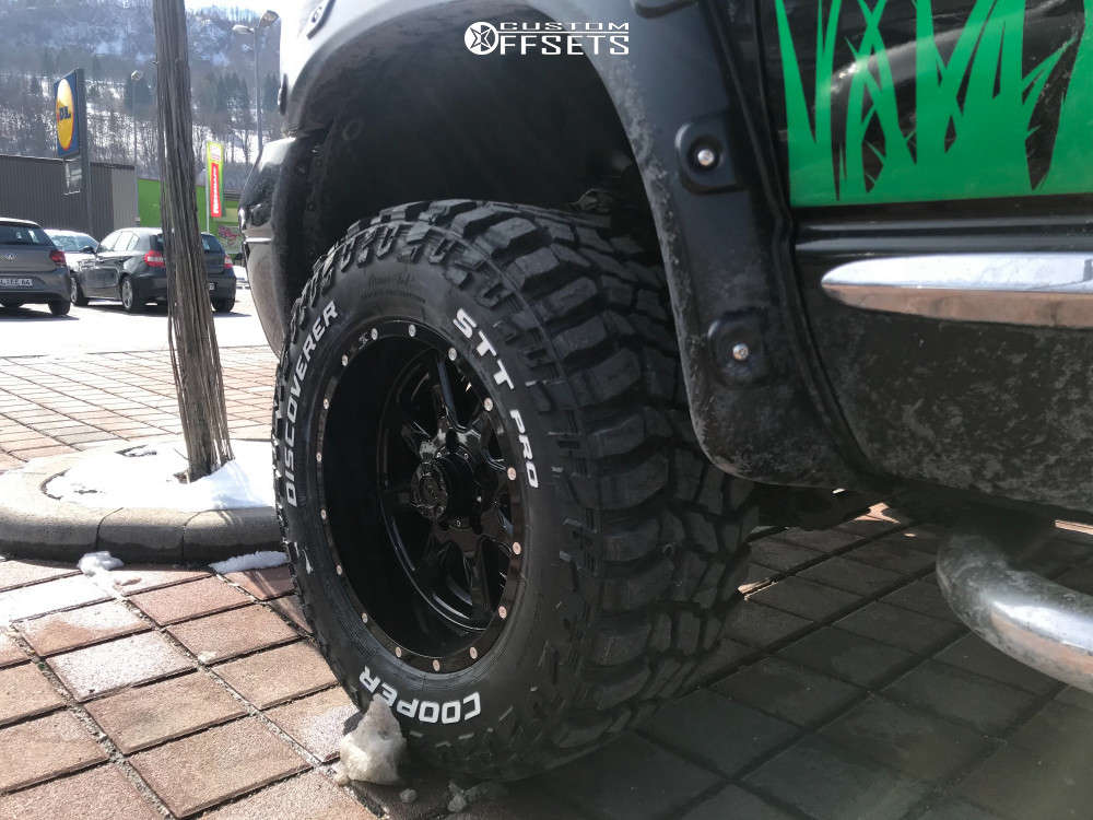 2008 Dodge Ram 1500 with 18x10 -24 Tuff T15 and 305/60R18 Cooper ...