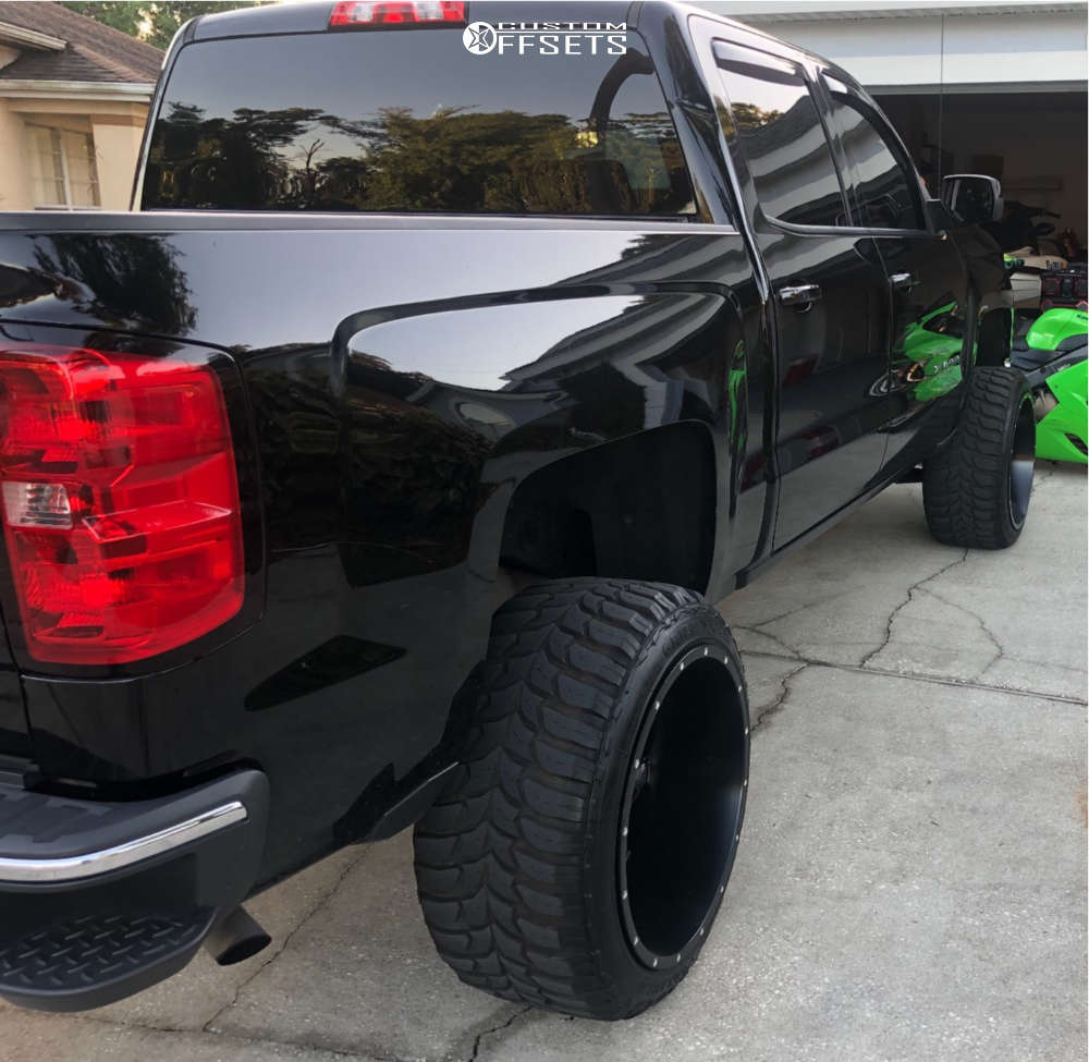 2014 Chevrolet Silverado 1500 with 22x14 -76 American Truxx Spider and 33/12.5R22 Pinnacle ...